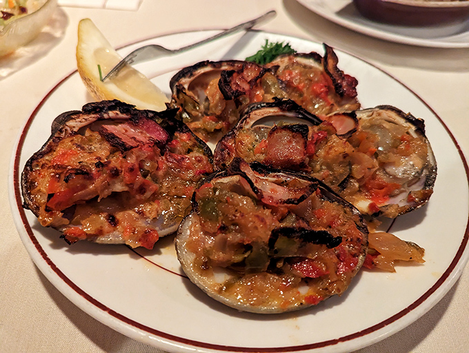 Clams Casino: where bacon and shellfish meet for a rendezvous that would make Neptune himself put down his trident and pick up a fork.