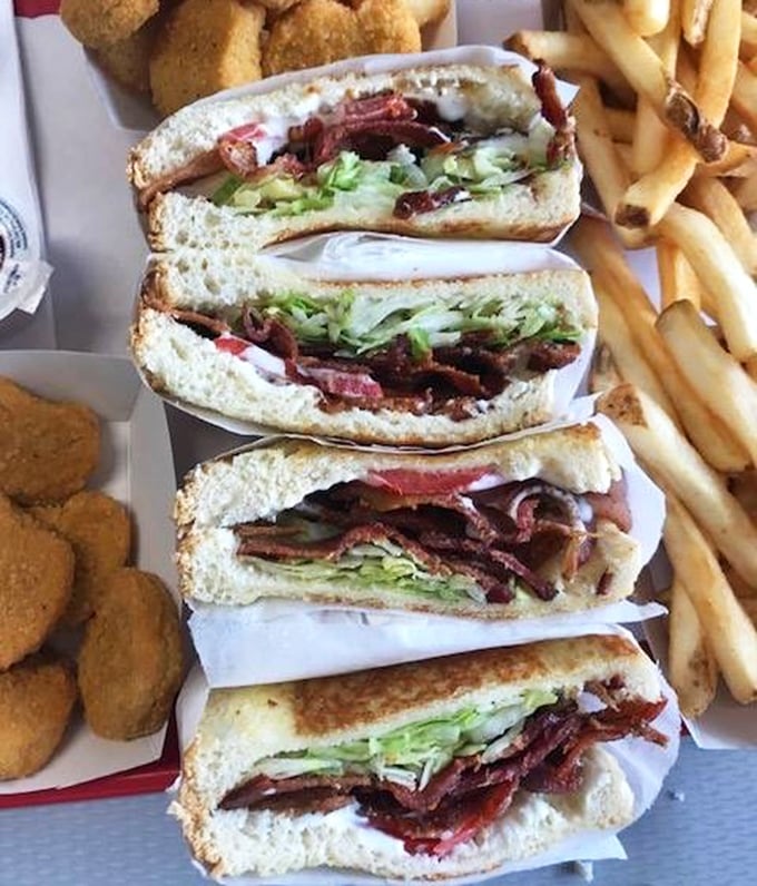 The club sandwich: architectural marvel of bread, meat, and vegetables that proves the sandwich isn't just lunch&mdash;it's a legitimate art form.