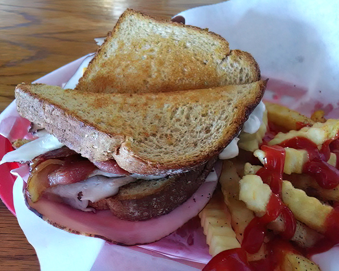 A proper diner sandwich doesn't need fancy aioli or artisanal bread&mdash;just honest ingredients stacked high enough to require a strategic first bite.