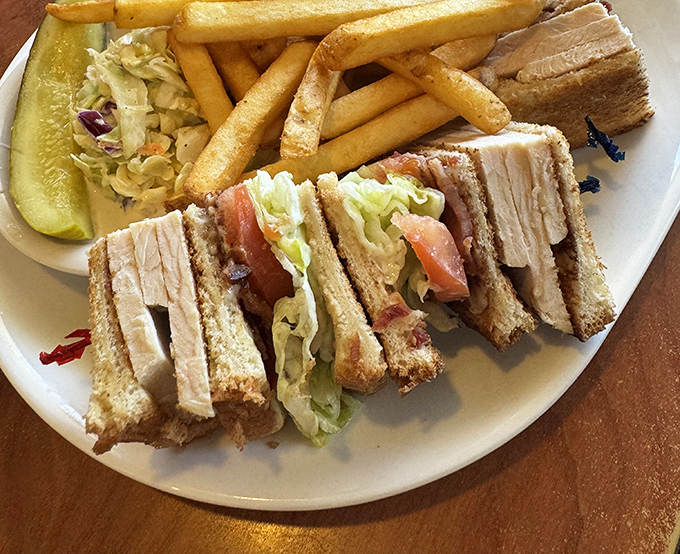 The club sandwich&mdash;architectural marvel of turkey, bacon, lettuce and tomato&mdash;arrives with a side of nostalgia and enough french fries to share (but you won't want to).