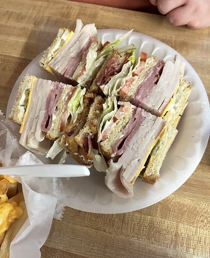 The club sandwich at Harold's is architectural perfection&mdash;layers of meat, cheese, and veggies creating a skyscraper of satisfaction.