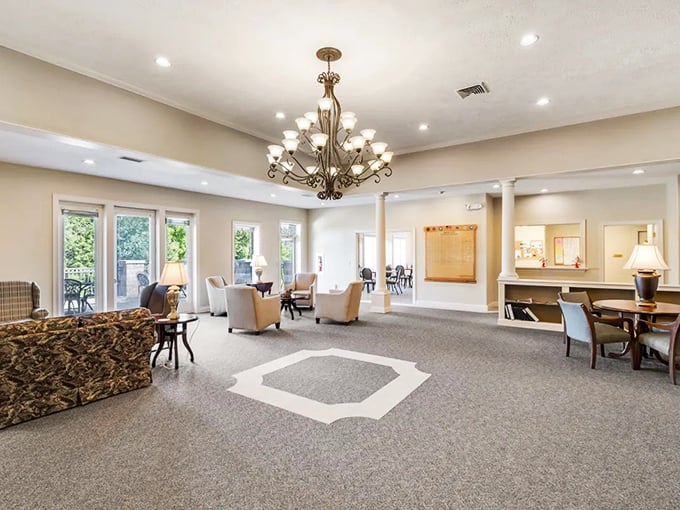 The clubhouse lounge where "community" isn't just a buzzword. Elegant lighting, comfortable seating, and not a plastic chair in sight.