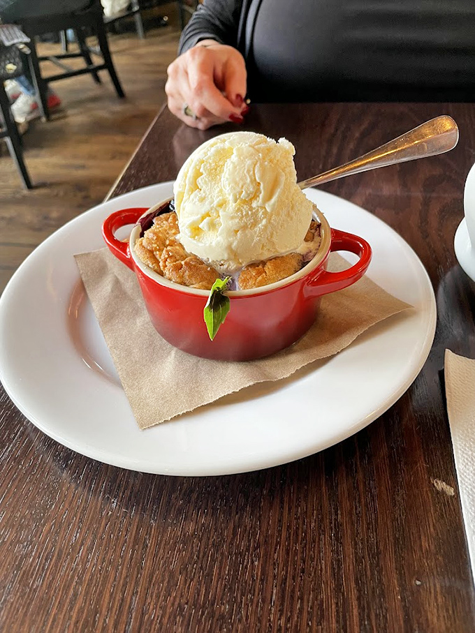 This warm cobbler topped with vanilla ice cream doesn't just end a meal&mdash;it creates a memory. The little red crock says "homemade" before your first bite.
