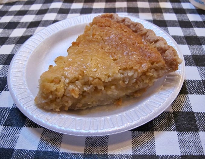 Chess pie so perfectly executed it could make a mathematician weep. That golden crust holds custard secrets passed down through generations.