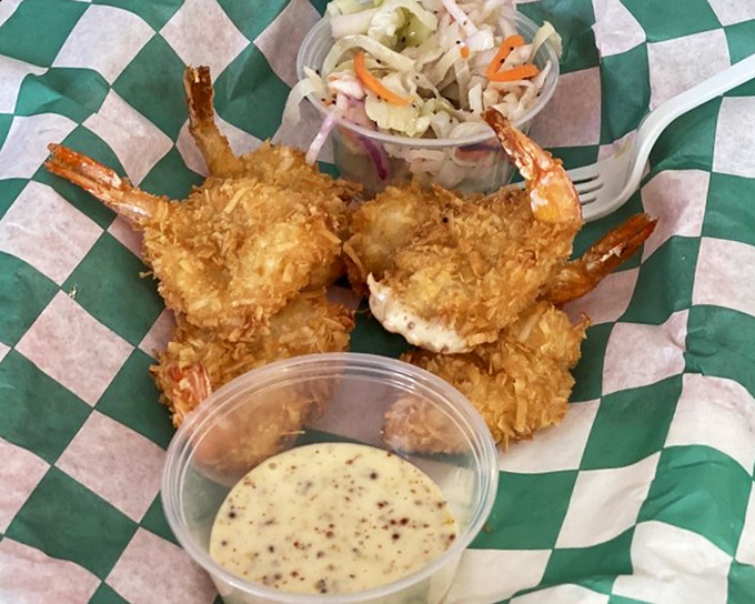 Coconut shrimp that look like they're wearing little tropical tuxedos. That dipping sauce isn't just a condiment&mdash;it's a supporting character deserving its own spin-off.