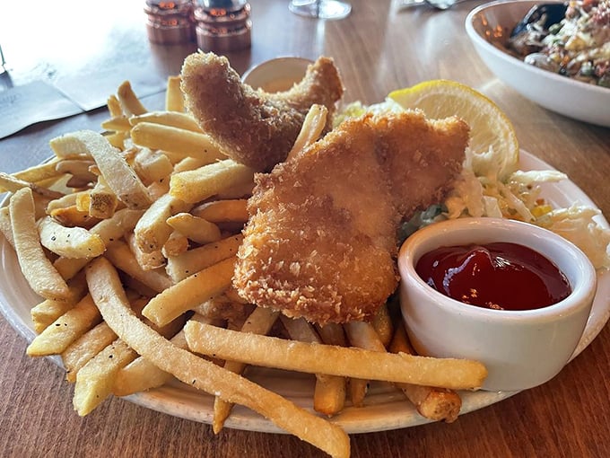 Golden-fried fish and chips &ndash; proof that sometimes the simplest pleasures are the most satisfying. That crunch speaks volumes.
