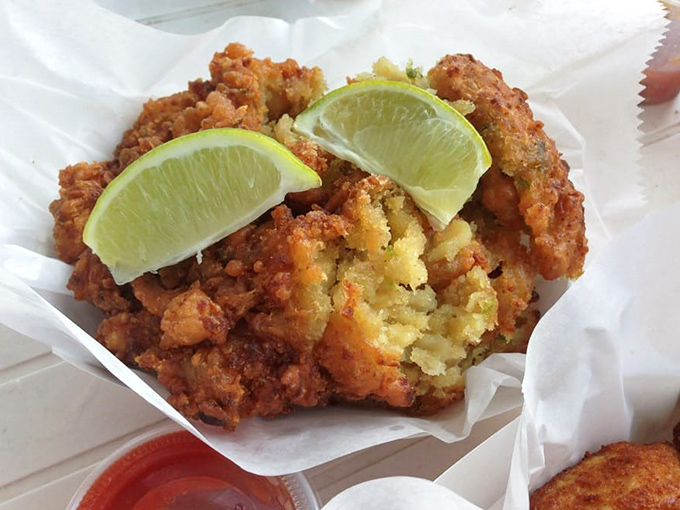Conch fritters so crispy and golden, they look like edible treasure from the sea itself.