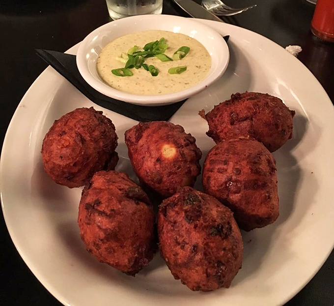 These corn fritters aren't just appetizers; they're golden orbs of happiness with a crispy exterior that gives way to sweet, savory perfection.