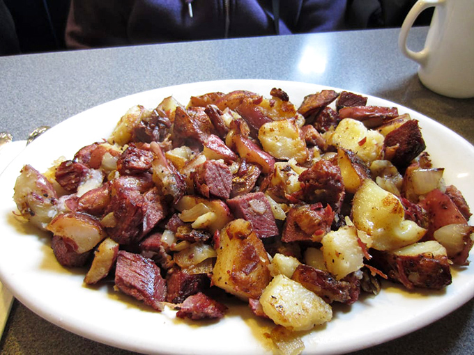 This isn't just corned beef hash &ndash; it's a masterclass in texture and flavor, where each crispy-edged potato cube has found its soulmate in tender corned beef.