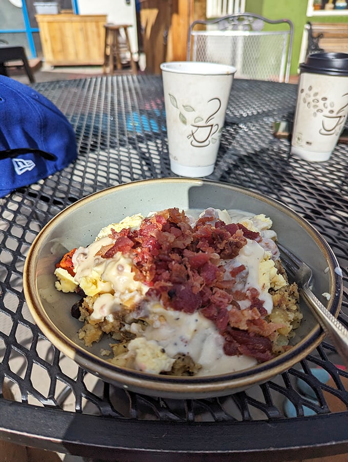 Breakfast alchemy: eggs, potatoes, and corned beef topped with gravy and bacon. The kind of dish that makes you consider moving to Salida permanently.