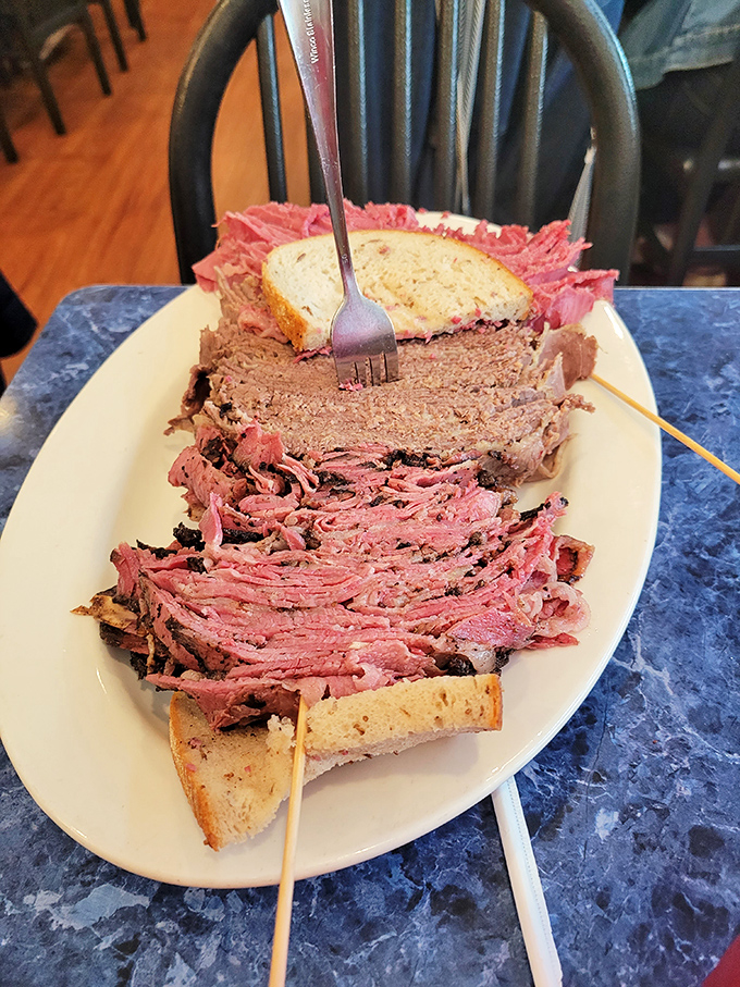 Fork required, dignity optional. Harold's corned beef sandwich isn't just a meal&mdash;it's a commitment that rewards your courage with melt-in-your-mouth perfection.