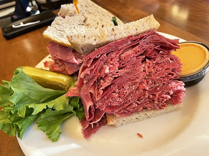 Behold the corned beef monument! This isn't just a sandwich; it's a masterpiece of meat engineering that demands respect.