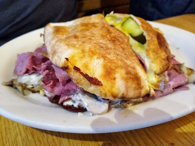 A sandwich that doesn't just speak to your hunger—it negotiates a peace treaty between your cravings and your satisfaction.