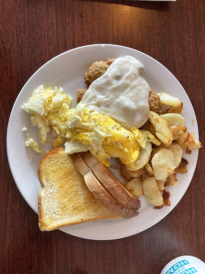 Country fried steak under a blanket of gravy &ndash; like a delicious security blanket for your taste buds.
