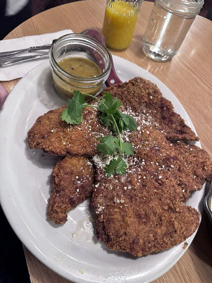 Country fried steak with a golden crust that crackles like autumn leaves, served with a side of "I'll-need-to-hike-a-mountain-after-this" sauce.