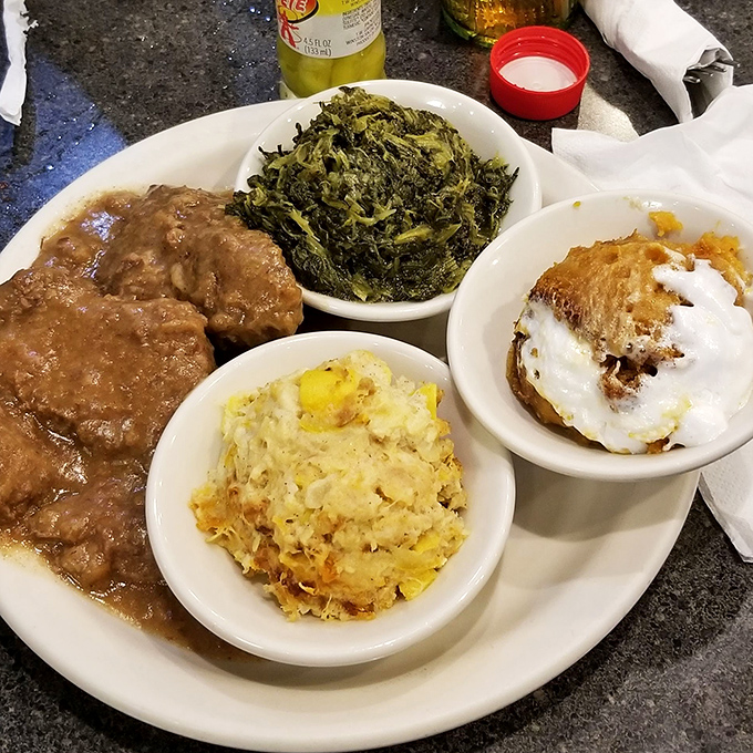 Country-style steak swimming in gravy alongside those famous greens &ndash; this is why elastic waistbands were invented.