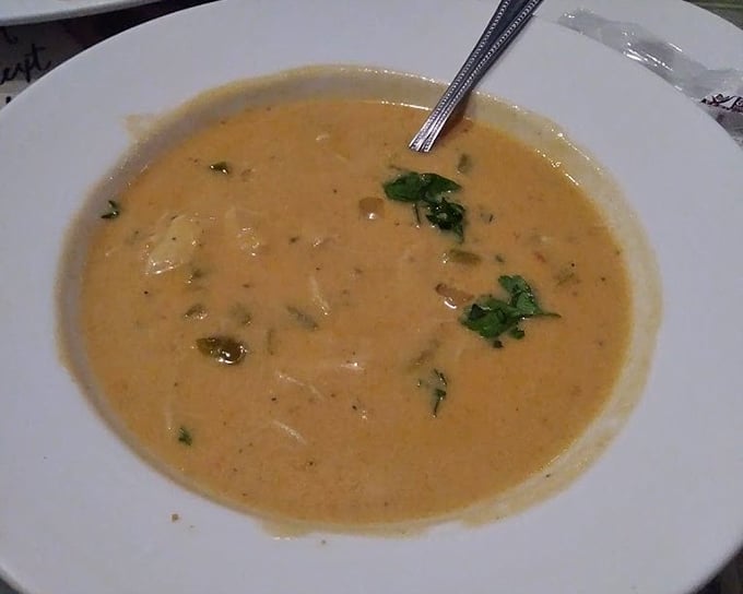 This crab bisque isn't just soup&mdash;it's a warm, creamy hug from the ocean, with each spoonful whispering tales of the Gulf.