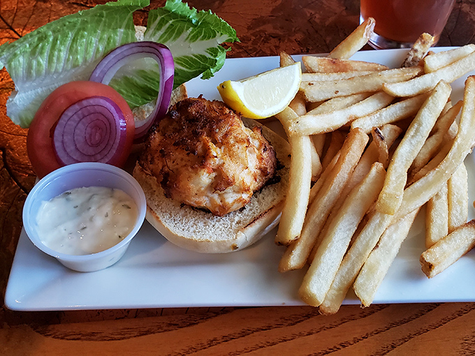 Maryland's state treasure on a plate! This golden-brown crab cake with minimal filler is what seafood fantasies are made of.