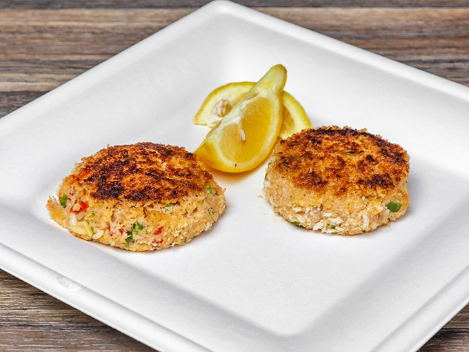 Two perfectly bronzed crab cakes that would make Maryland natives nod in respectful approval – lumpy in all the right ways.