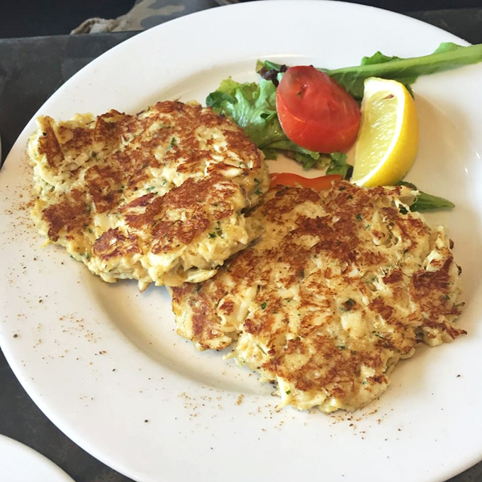 Maryland crab cakes done right&mdash;mostly crab, minimal filler, perfectly golden&mdash;served with the requisite lemon wedge that's more tradition than necessity at this point.