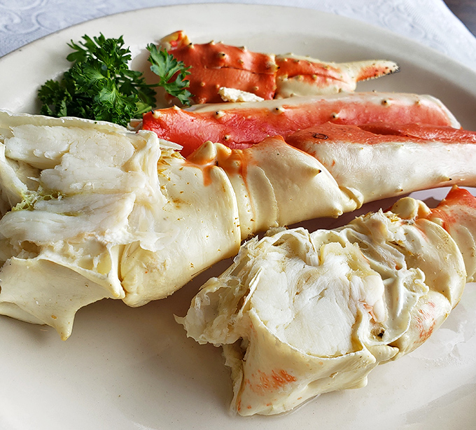 King crab legs that transport you to Alaskan waters without leaving Ohio. Nature's perfect design: a treasure chest of sweet meat requiring just enough effort to feel earned.