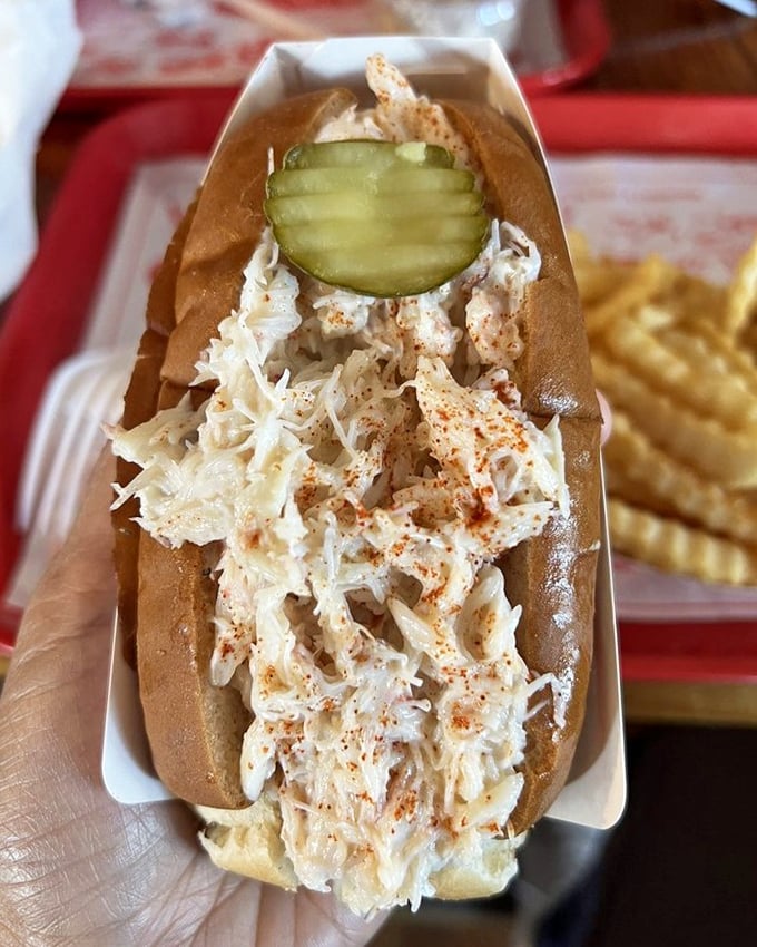 This lobster roll isn't playing games &ndash; chunks of sweet meat practically spilling over the sides. Restraint is overrated.