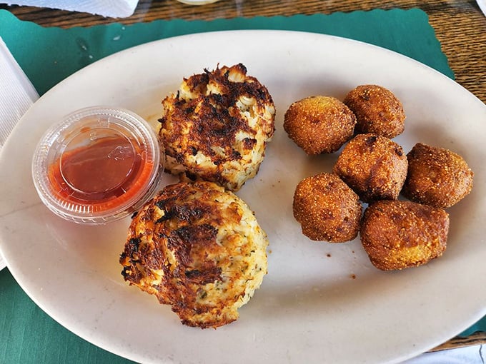 Golden-brown crab cakes that are all meat and no filler, paired with hush puppies that live up to their name&mdash;they'll silence your hunger immediately. 