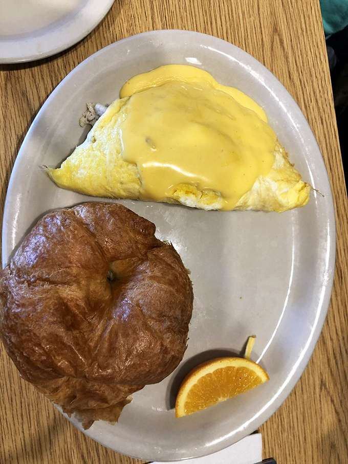 This omelet, draped in hollandaise and paired with a buttery croissant, is the breakfast equivalent of wearing cashmere pajamas.