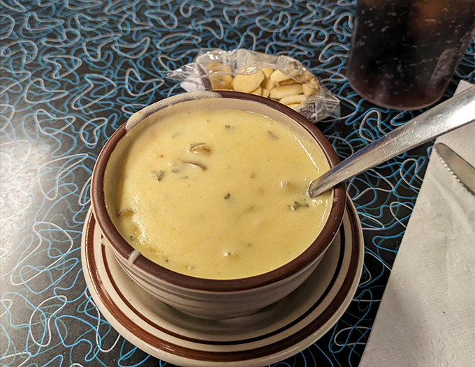 Creamy potato soup that looks like liquid comfort in a bowl. The kind grandmothers everywhere would approve of, served with crackers for necessary dunking operations.