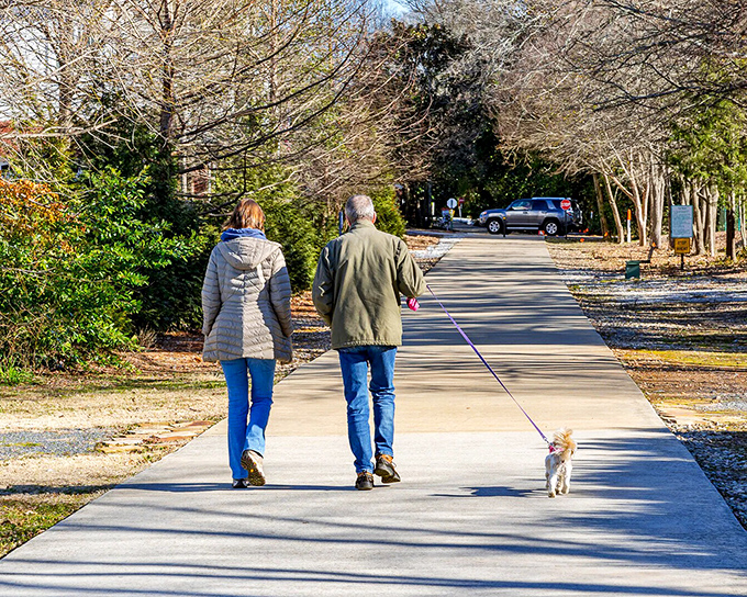 Nothing says "we're not in a hurry here" like a leisurely dog walk along Covington's peaceful trails, where even the smallest companions set the perfect Southern pace.