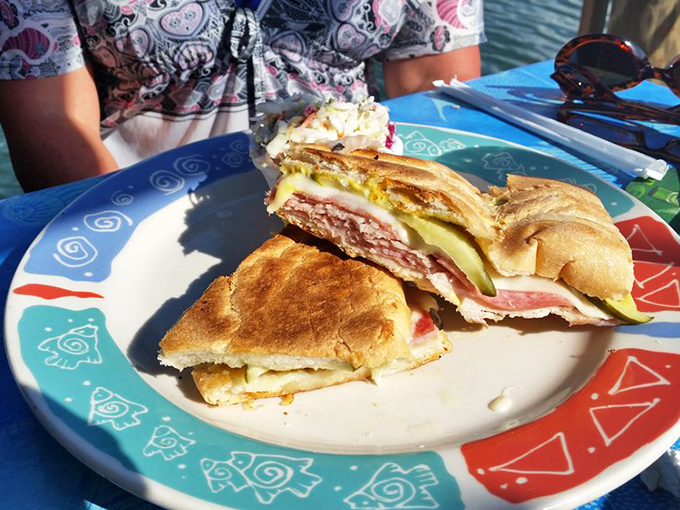 The Cuban sandwich, split open to reveal its secrets&mdash;a cross-section of Florida culture pressed between perfectly toasted bread.