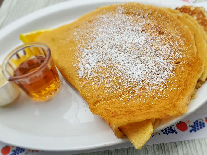 Another Danish pancake masterpiece—golden, delicate, and waiting to be transformed by that little pitcher of maple syrup into something transcendent.