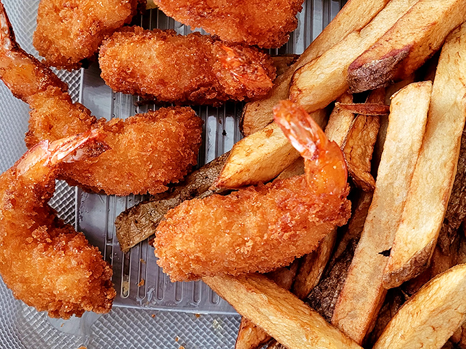 Golden-brown perfection meets crispy fries – proof that sometimes the simplest pleasures are the most satisfying.