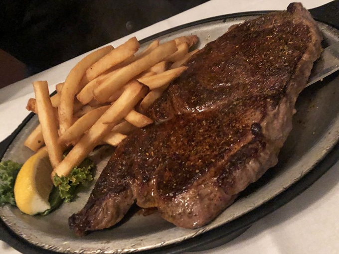 This isn't just a steak; it's a declaration of beef independence. Perfectly seared Delmonico with golden fries—comfort food that graduated with honors.