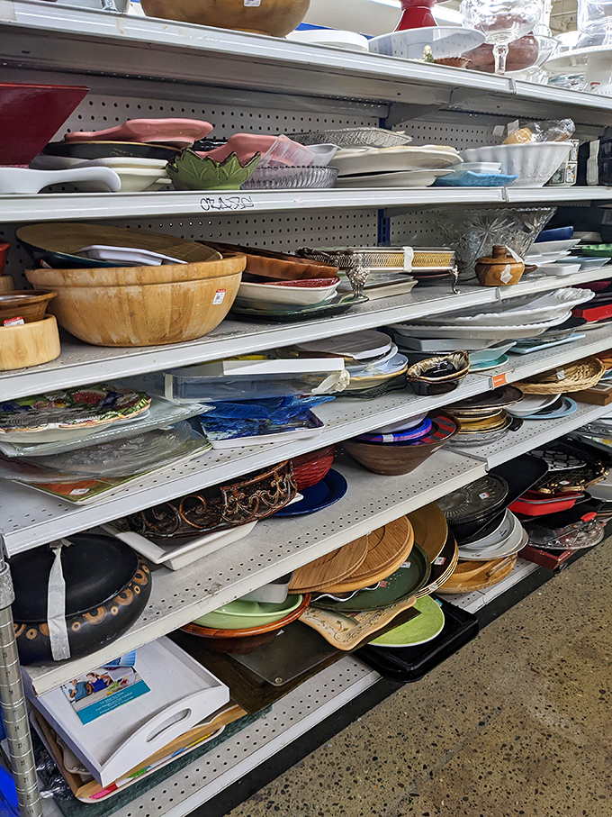 Plates, bowls, and serving dishes stacked with chaotic precision – where else can your dinner party theme change weekly for under $20?