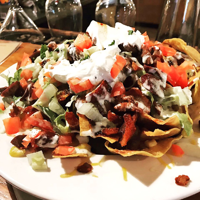 These loaded nachos don't just speak to you&mdash;they sing a full opera of flavors with each perfectly constructed bite.