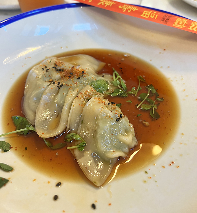 The famous seafood dumplings float in a fragrant broth that you'll be tempted to sip with a straw.