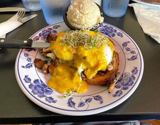 Eggs Benedict gets the Kentucky treatment with a golden hollandaise blanket that makes you want to cancel all afternoon plans.