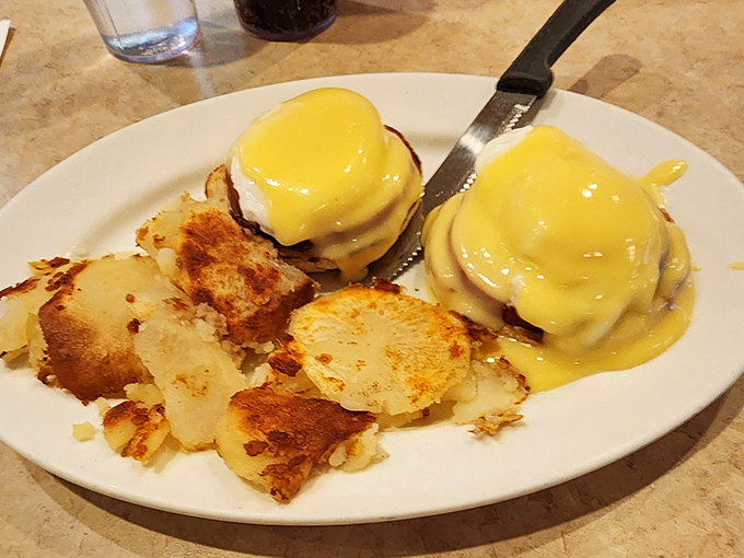 Eggs Benedict that hits all the right notes – perfectly poached eggs, Canadian bacon, and hollandaise sauce that's clearly on speaking terms with real butter and fresh lemons.