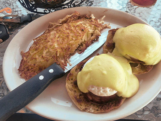 Eggs Benedict with hash browns so crispy they deserve their own fan club. Hollandaise sauce that could end family feuds.