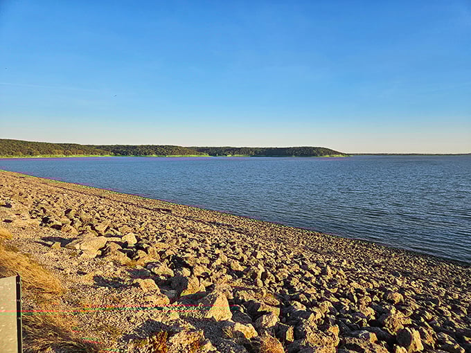 Elk City Lake's serene shores offer a peaceful retreat where fishing costs nothing but time and patience.