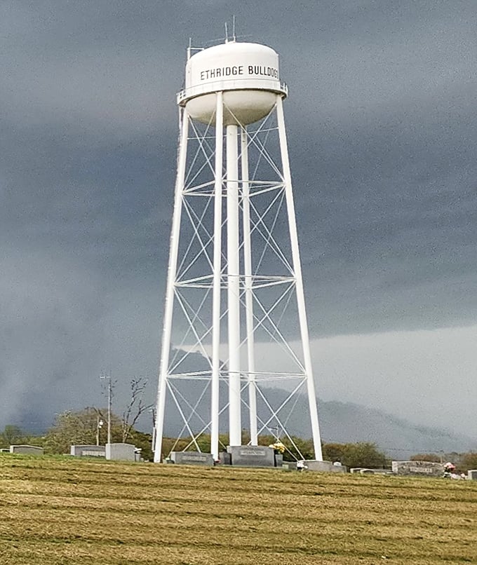 The Ethridge water tower stands sentinel over the community, a modern landmark in a place that largely eschews modernity.