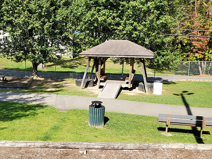 This humble park pavilion has witnessed countless family reunions, first kisses, and impromptu picnics &ndash; the silent keeper of small-town memories.