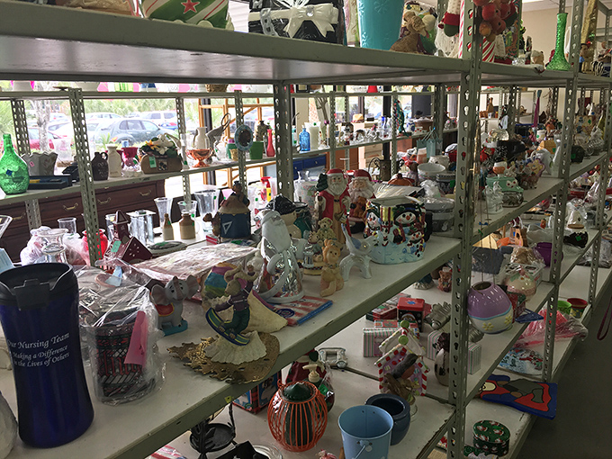 Holiday figurines and knickknacks stand at attention, like tiny soldiers from Christmas past waiting for their next deployment.