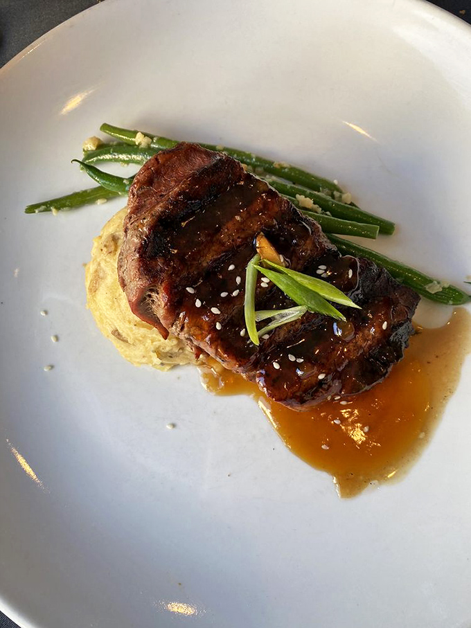 The filet mignon with its shiitake reduction is the Rolls-Royce of beef experiences&mdash;elegant, perfectly engineered, and worth every moment of anticipation.