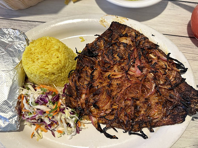 Fire-kissed trout that's traveled further from water than you have, yet somehow tastes fresher than your morning coffee.