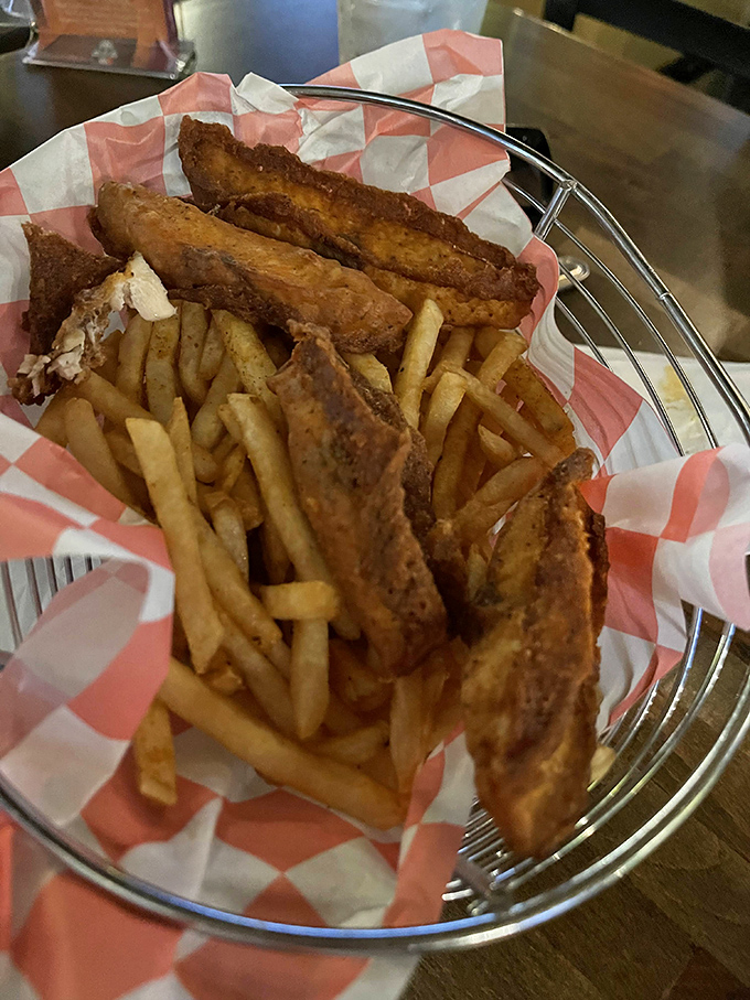 Fish and chips done right &ndash; crispy, golden batter protecting flaky white fish, served with proper chips in a basket that screams "comfort food" in any accent.