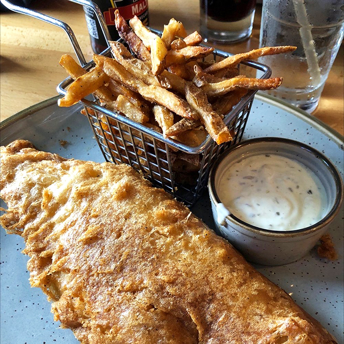 Crispy on the outside, tender within&mdash;this fish and chips basket comes with a side of nostalgia and a dipping sauce worth double-dipping for.