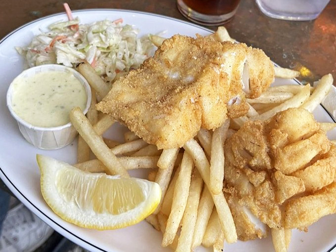 Fish and chips that would make a British pub jealous&mdash;golden, crispy perfection with fries that somehow stay crisp until the last bite.