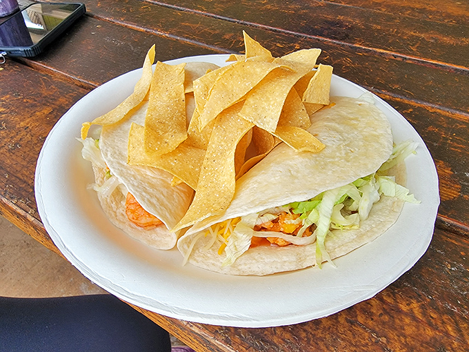 Tortillas cradling their precious cargo of shrimp like a mother holding her newborn &ndash; with love and a side of chips.